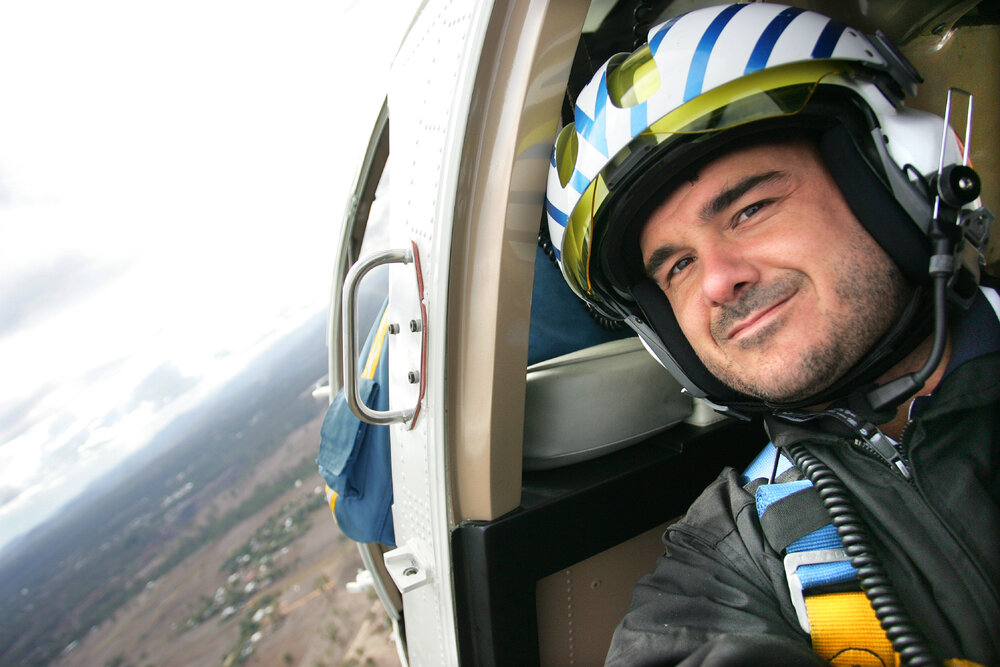 Queensland Times photo journalist flying in an Energex helicopter over ...